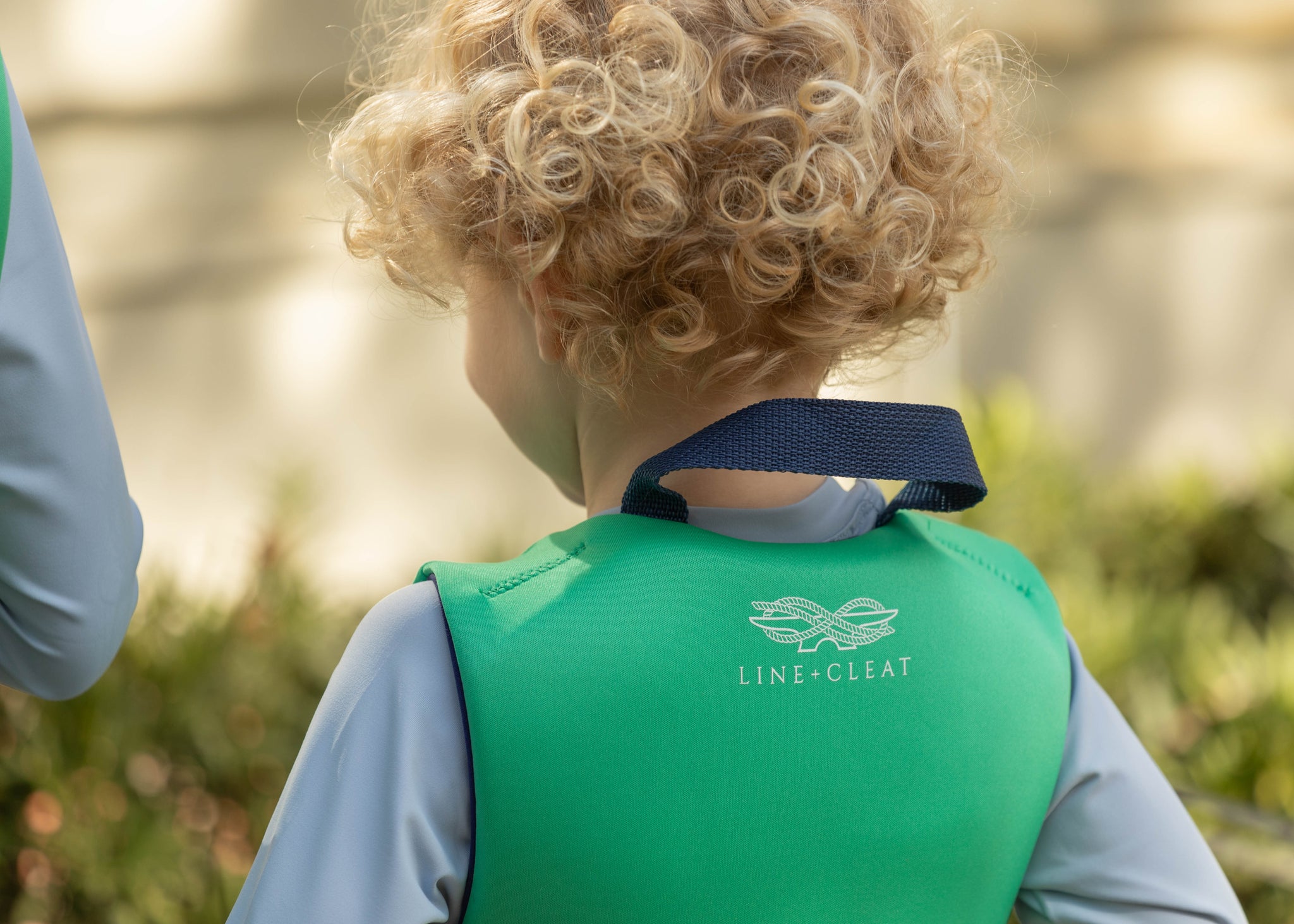 Green USCG Child Life Jacket – Line + Cleat